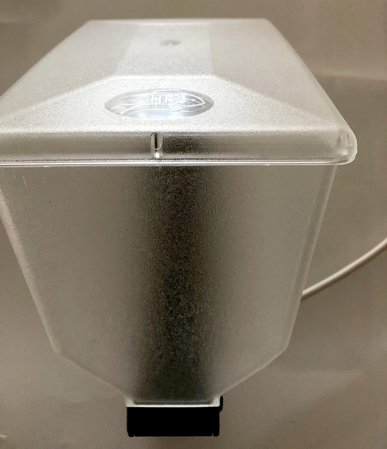 Standard Hopper Dispensing Feed by Hatchery Feeding Systems